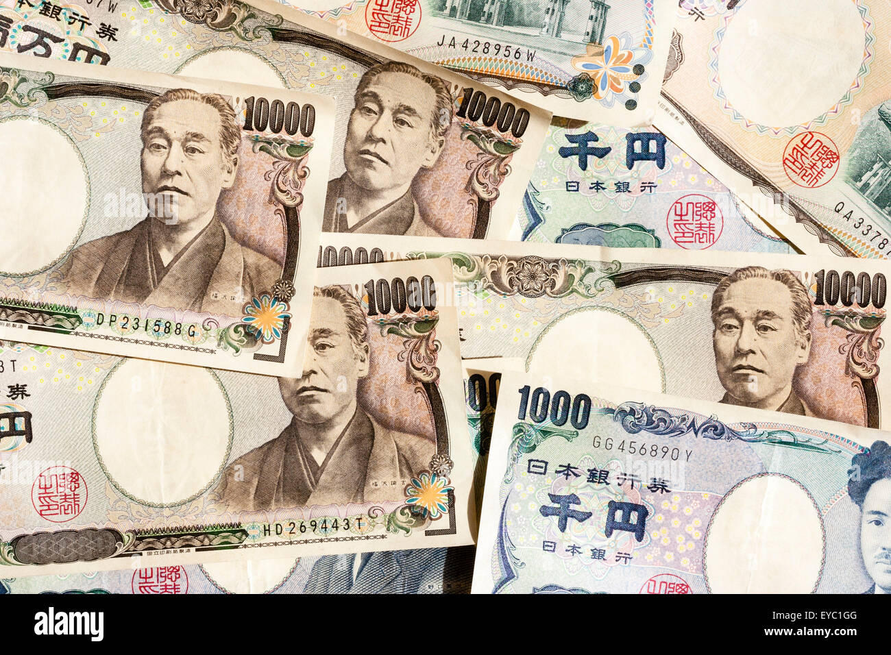 Close up of several different value Japanese banknotes with the values ...