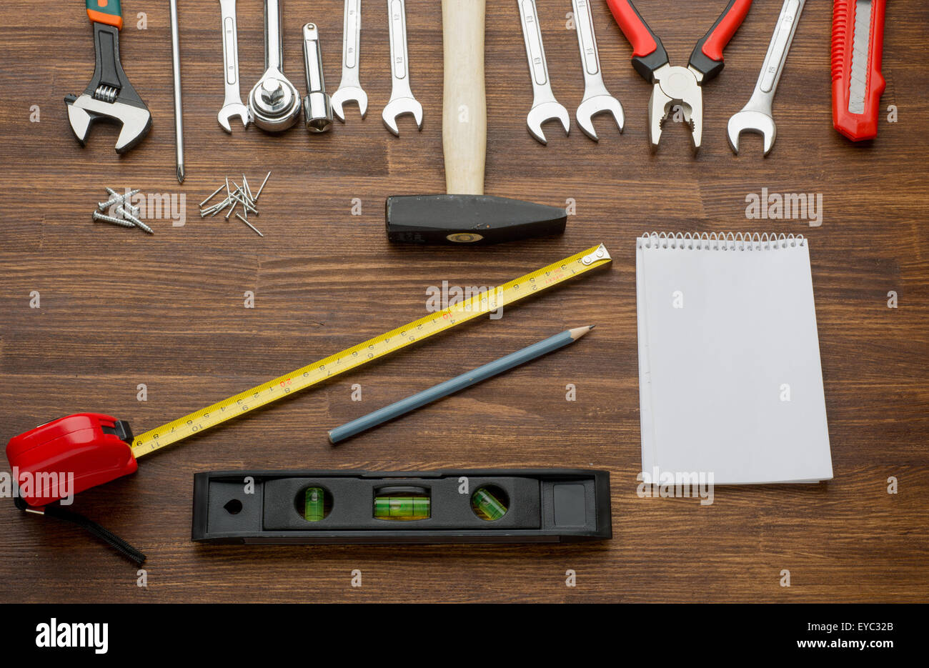 Set of tools over a wood panel with space for text Stock Photo - Alamy
