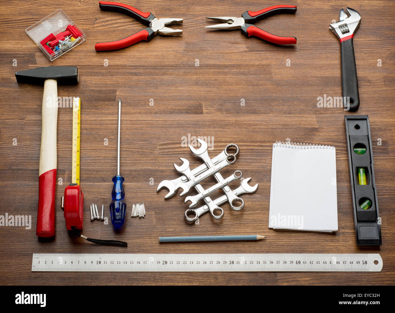 Set of tools over a wood panel with space for text Stock Photo - Alamy
