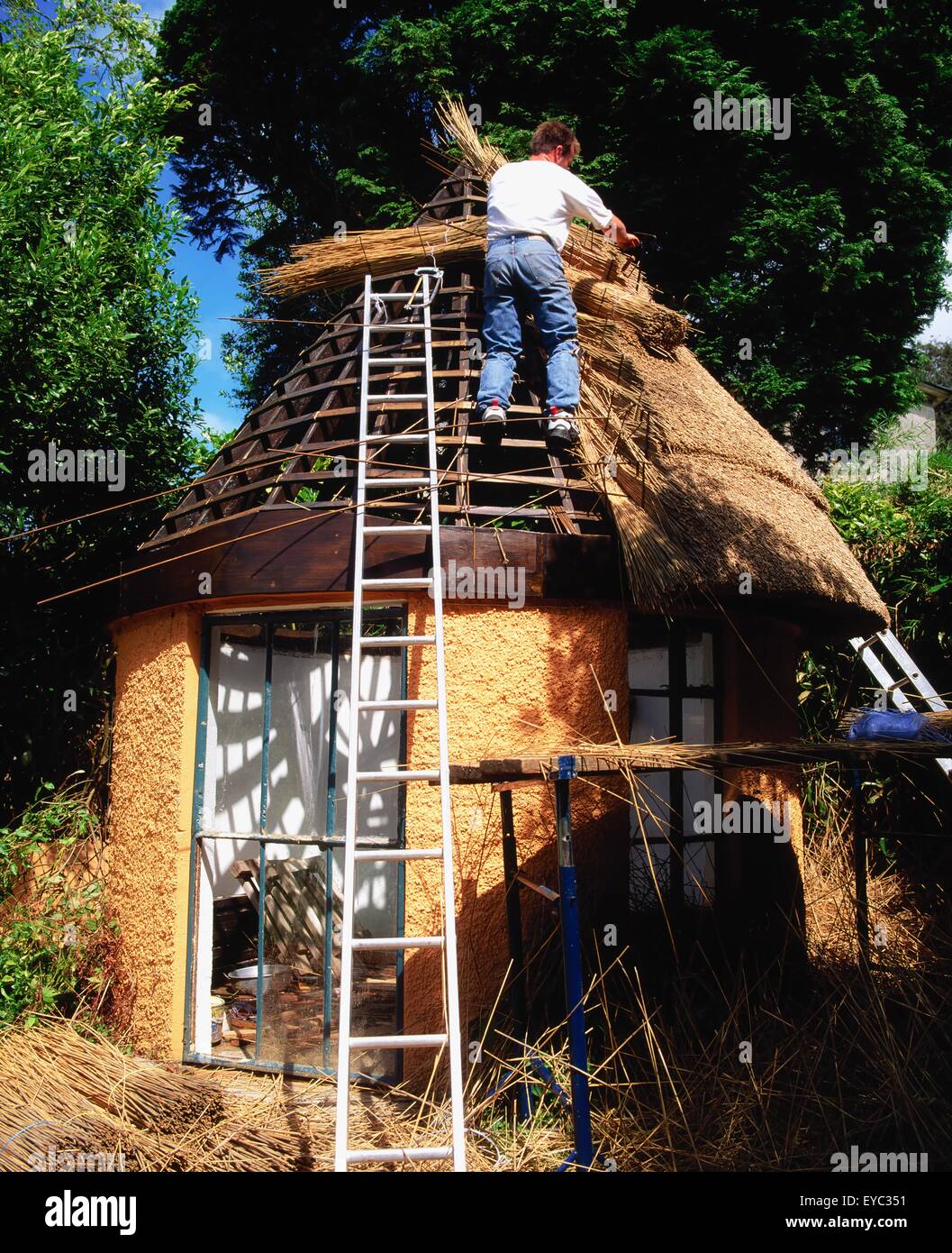 Creagh, Co Cork, Ireland; Man Thatching A Summer Cottage Stock Photo ...
