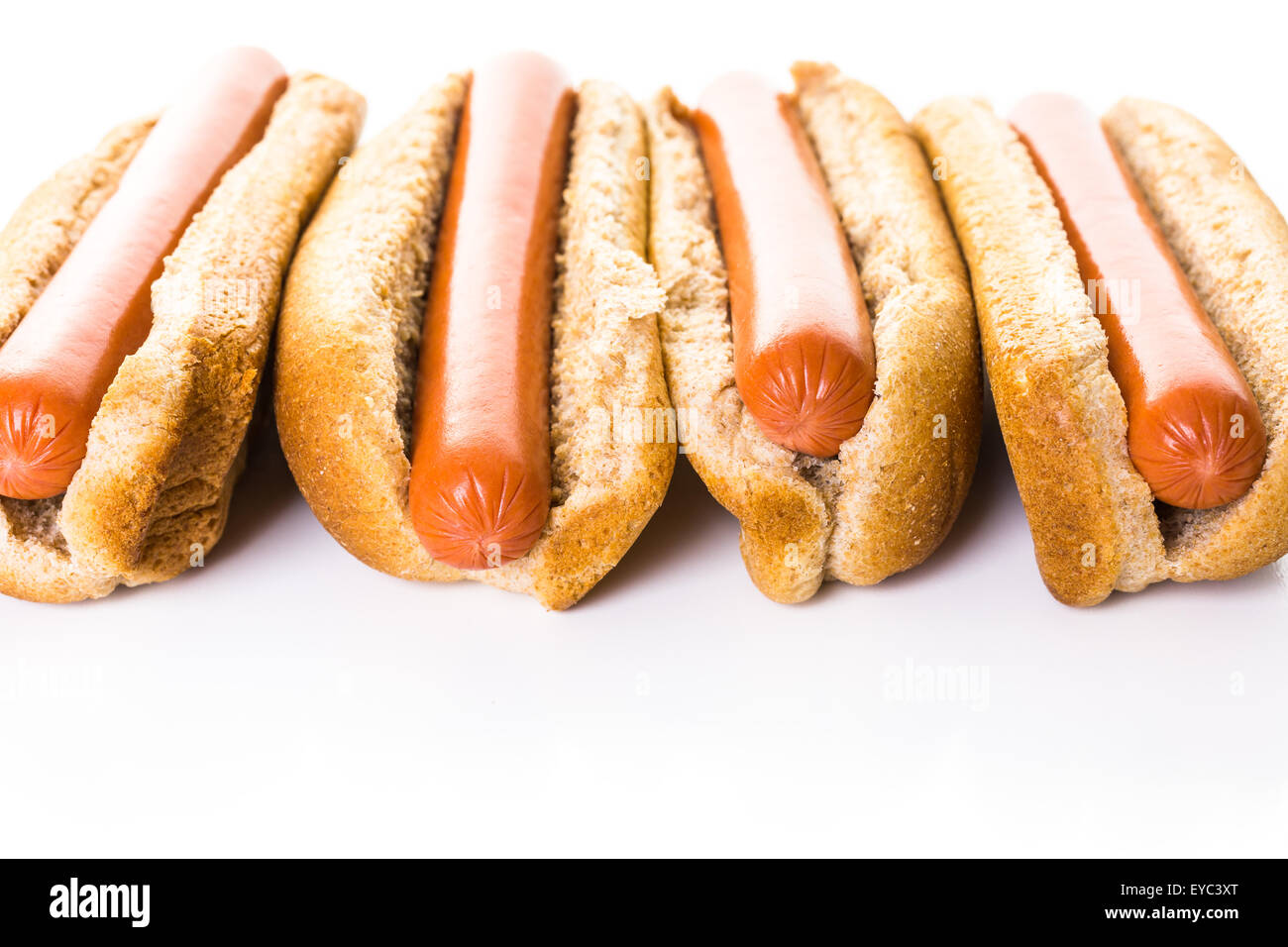 Traditional hot dogs on a white hot dog bun on a white background Stock ...