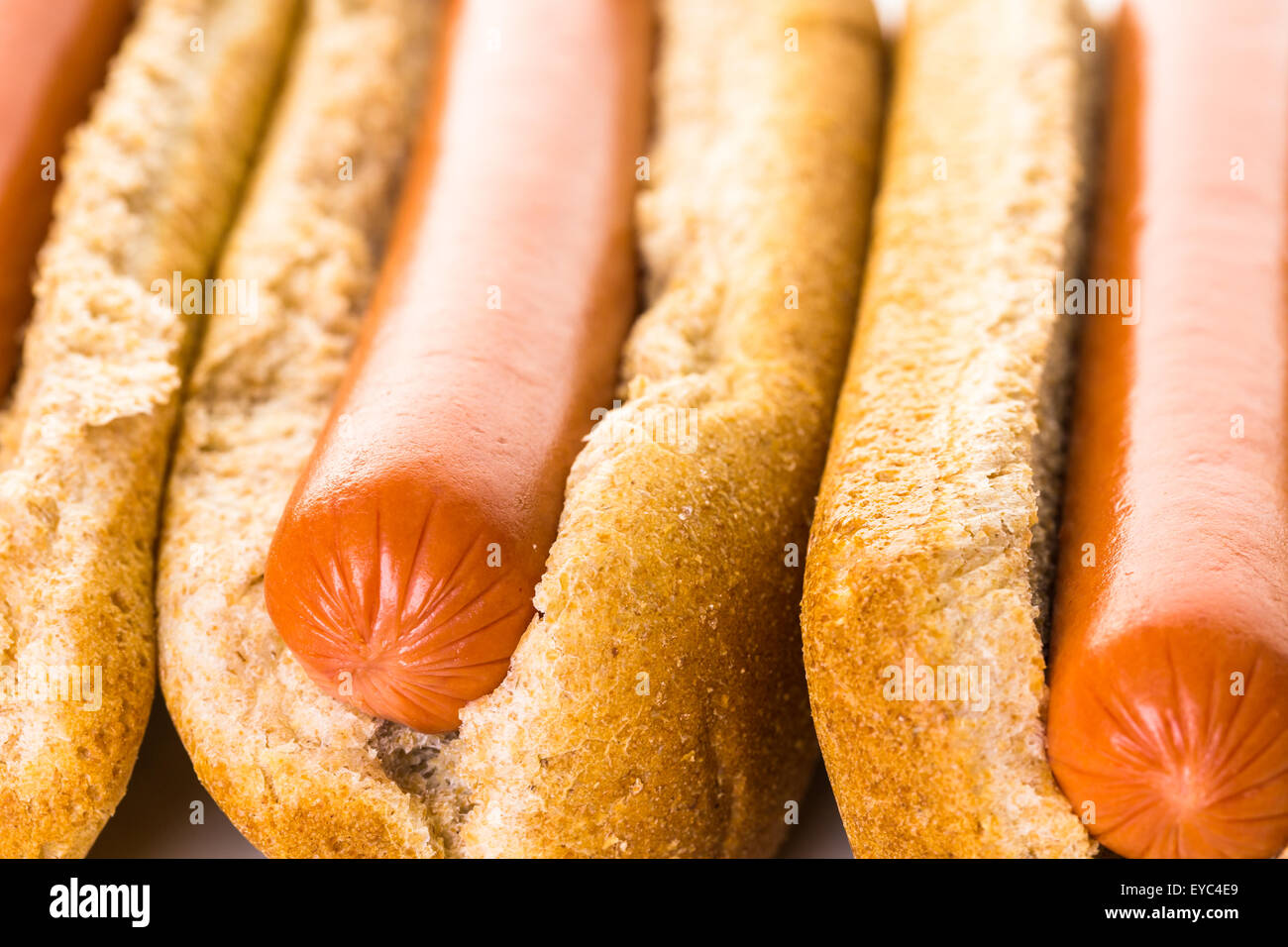 Traditional hot dogs on a white hot dog bun on a white background Stock ...