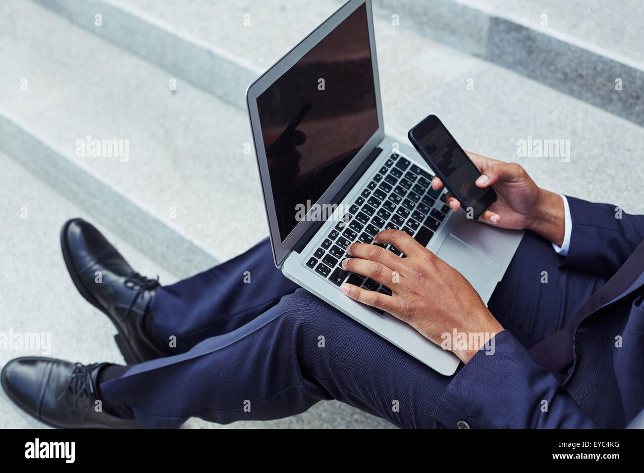 Modern businessman using electronic gadgets Stock Photo - Alamy