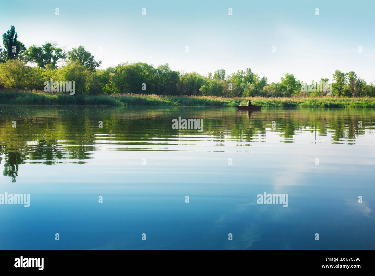 River landscape with sky reflection in water Stock Photo - Alamy