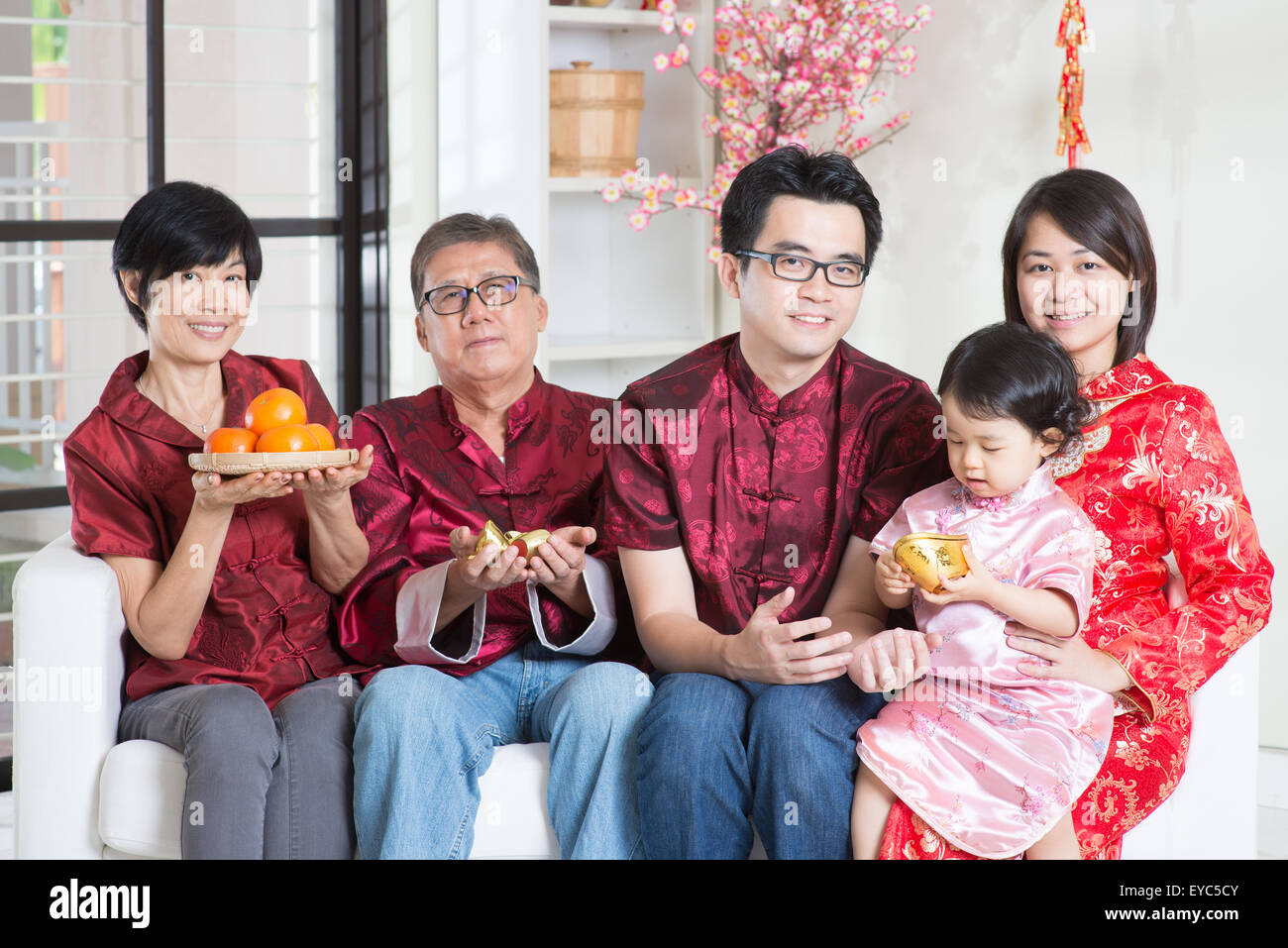 Celebrating Chinese new year. Happy Asian multi generations family in ...