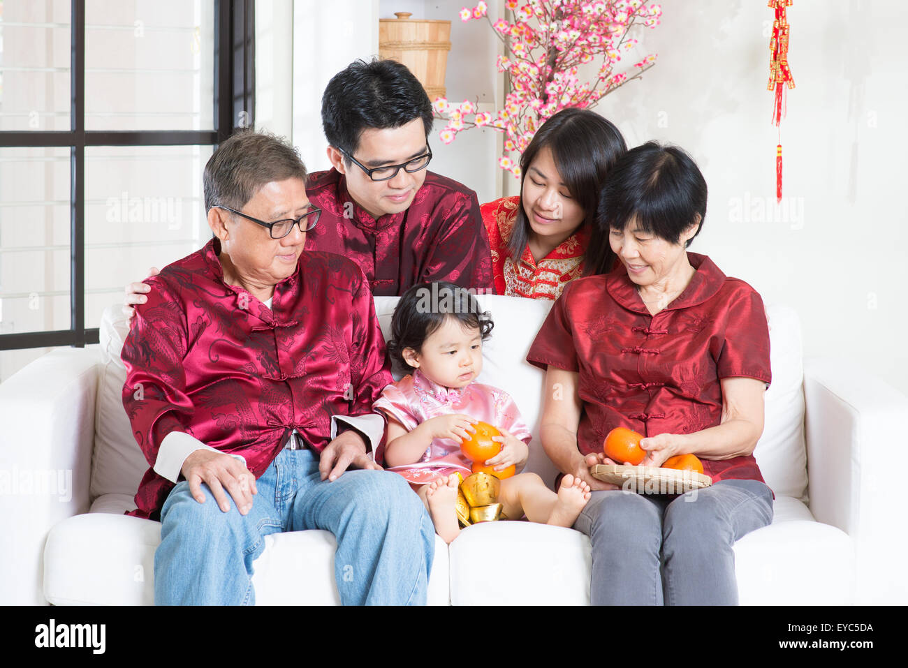 Chinese new year festival. Happy Asian multi generations family in red ...