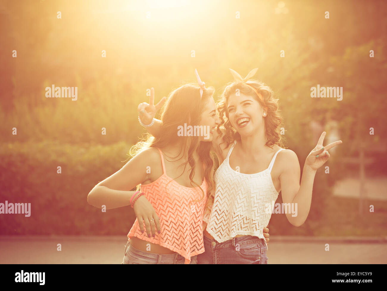 Best girlfriends hug. Girls dressed in the style of Pin-up girl ...