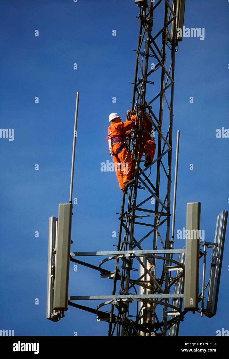 Maintenance being performed on a phone mast hi-res stock photography ...