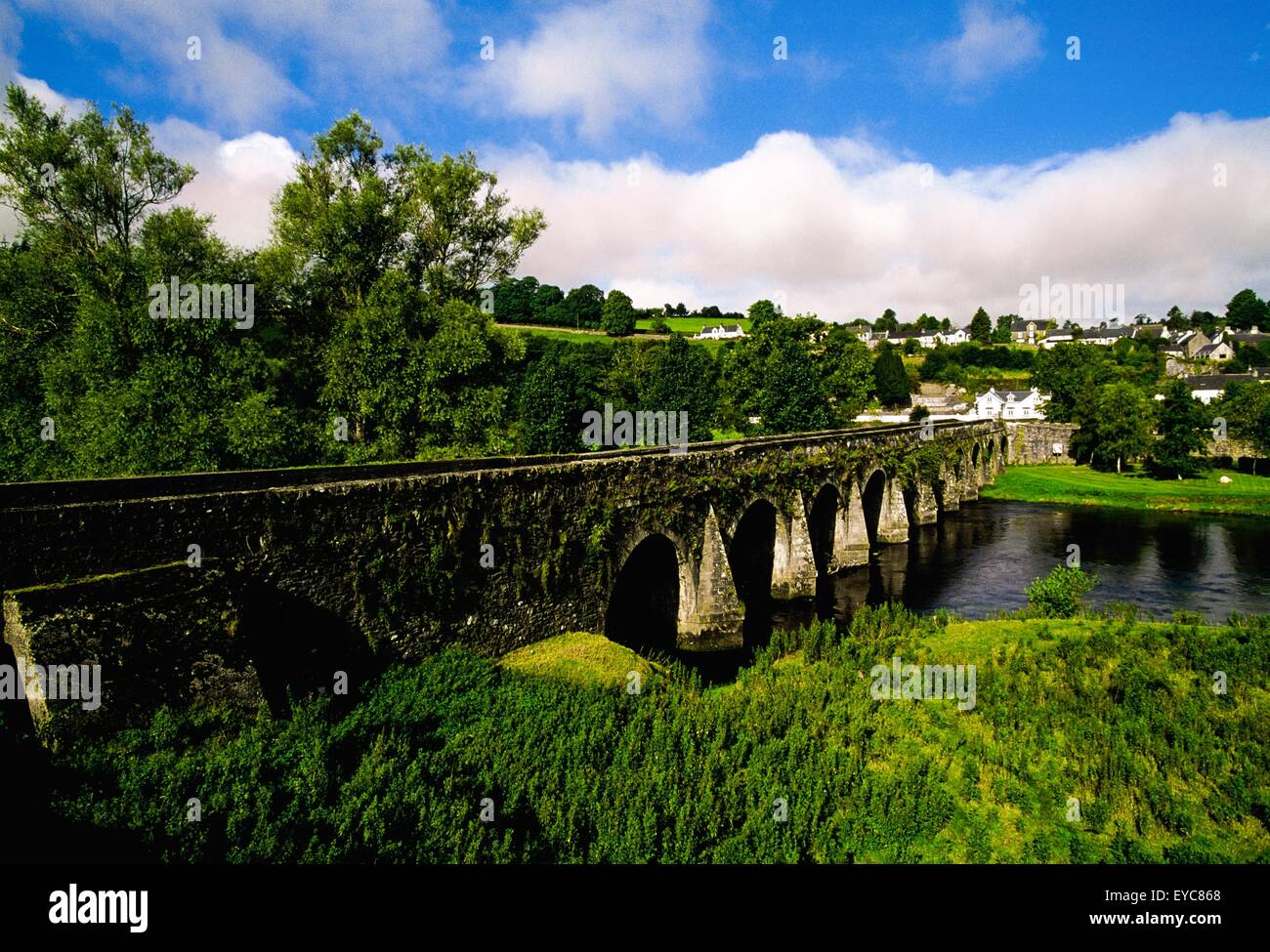 Ireland; Old Bridge With A Town In The Distance Stock Photo - Alamy