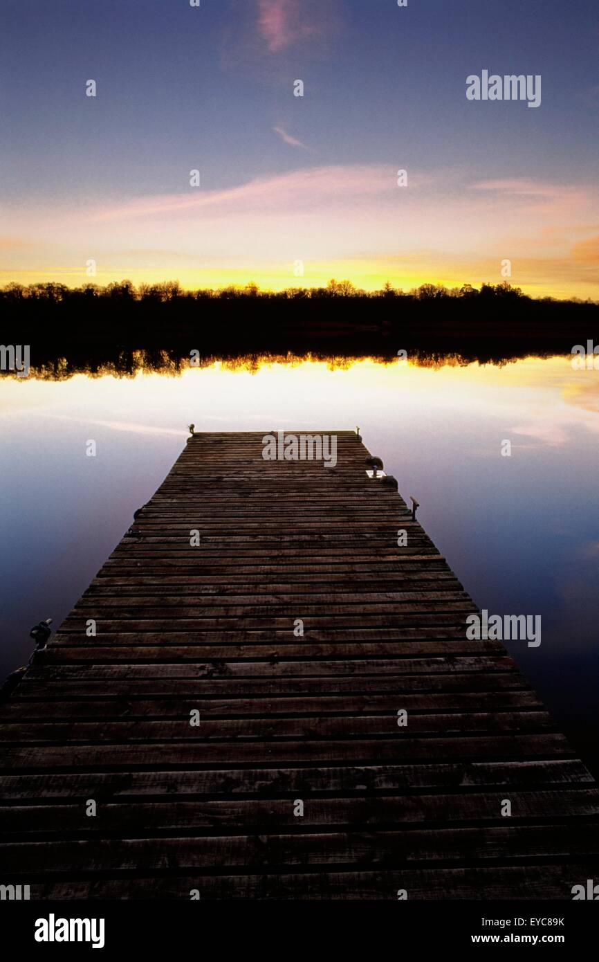 Dock At Sunset Stock Photo - Alamy