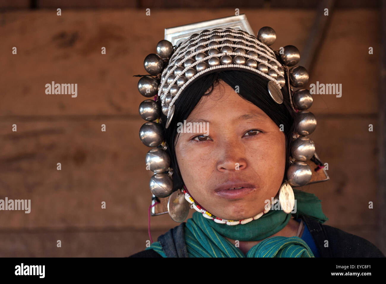 Local woman from the Akha tribe with typical headgear, portrait, Hokyin ...