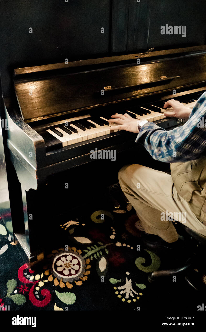 man playing a piano Stock Photo - Alamy
