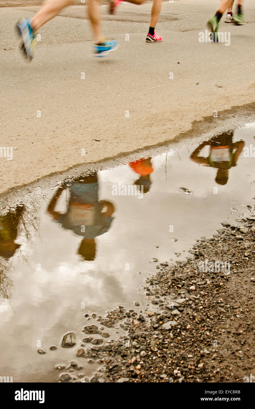 marathon runners legs and reflection Stock Photo - Alamy