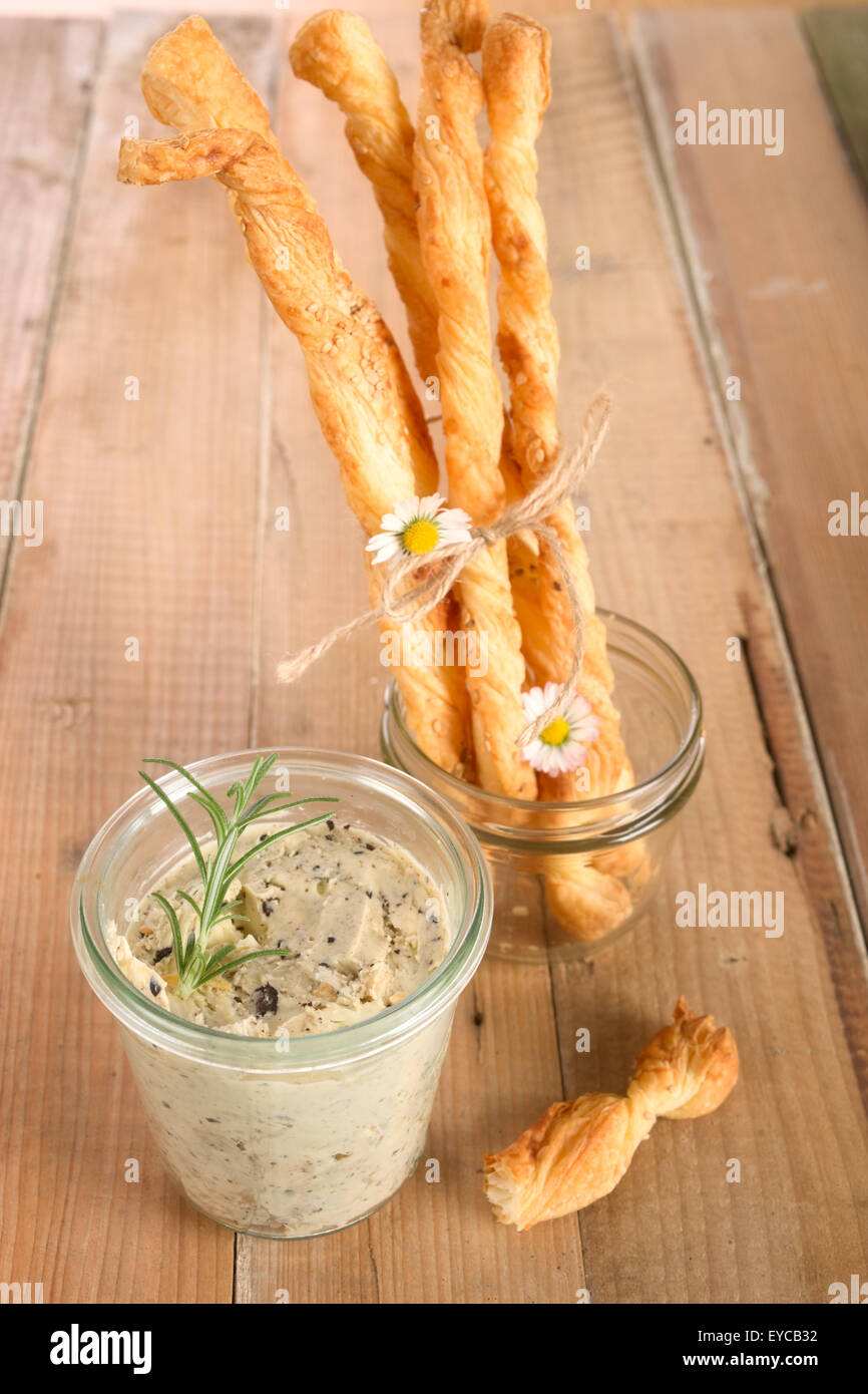 Twisted sesame sticks and butter spread Stock Photo - Alamy