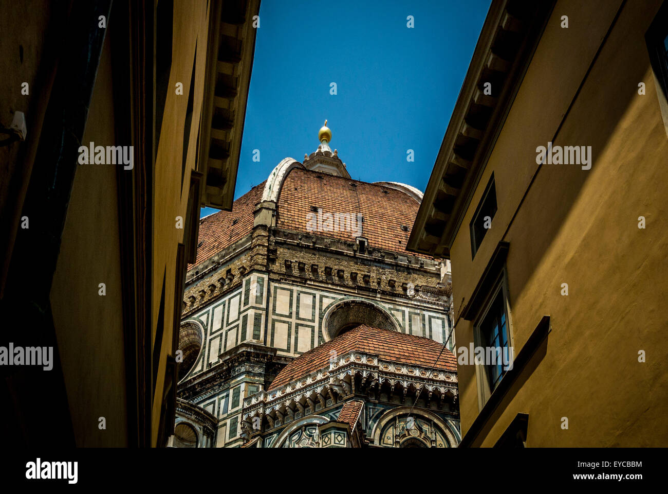 Filippo Brunelleschi's dome on Florence Cathedral glimpsed between ...