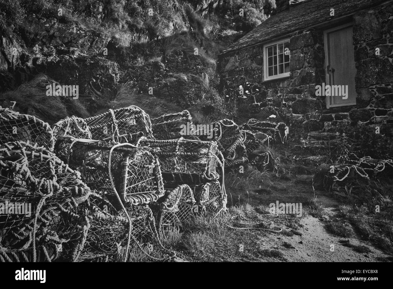 Fishing cottage and fishing pots Stock Photo - Alamy