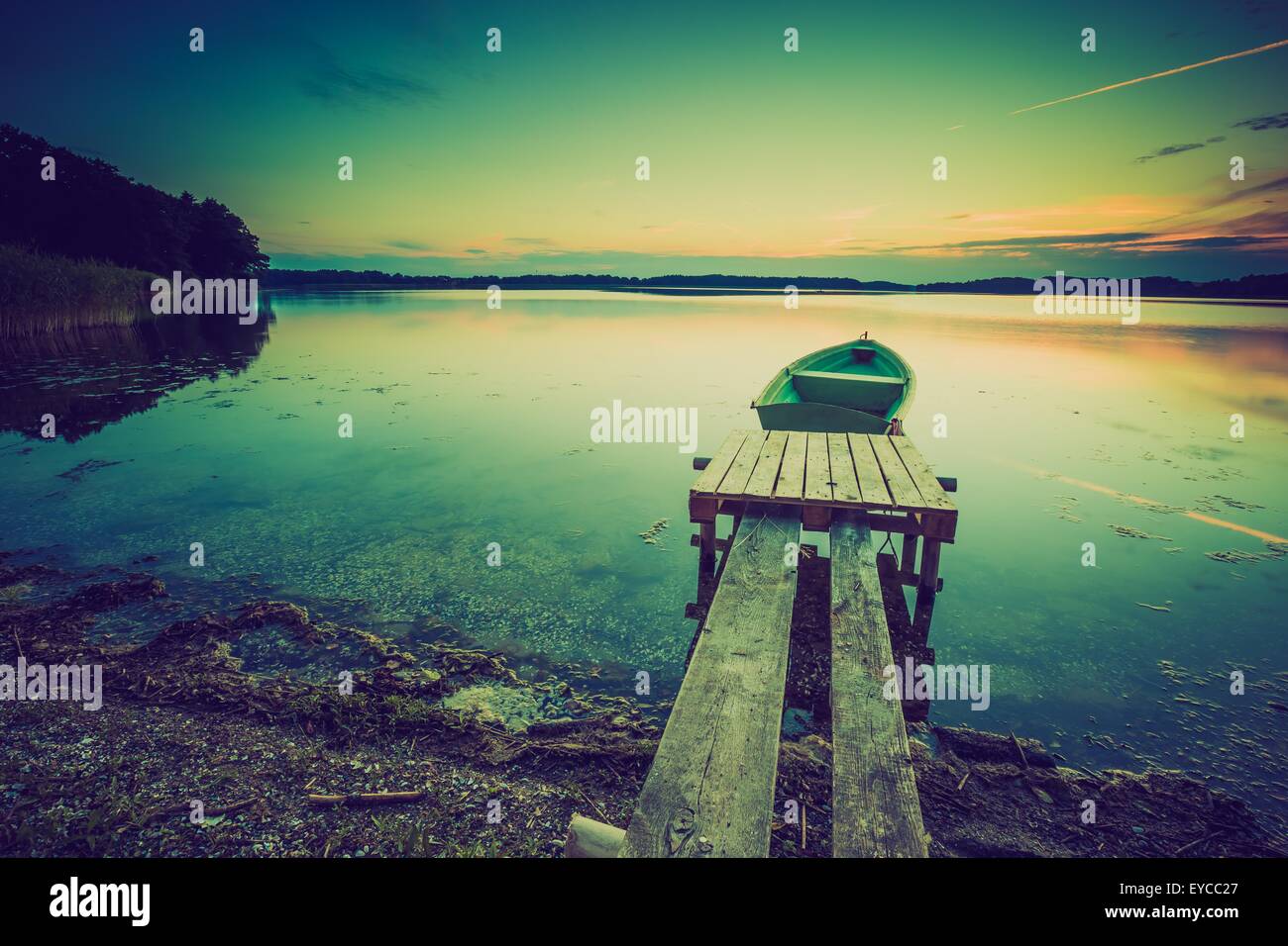 Vintage photo of beautiful lake sunset. Polish lake in Mazury lake ...