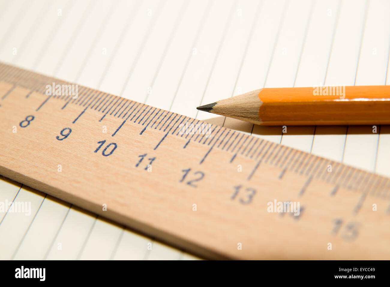 Notepad with a recording sheet, pencil and wooden ruler Stock Photo - Alamy