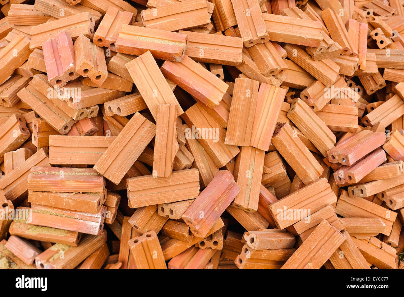 Big pile of bricks in construction site Stock Photo - Alamy