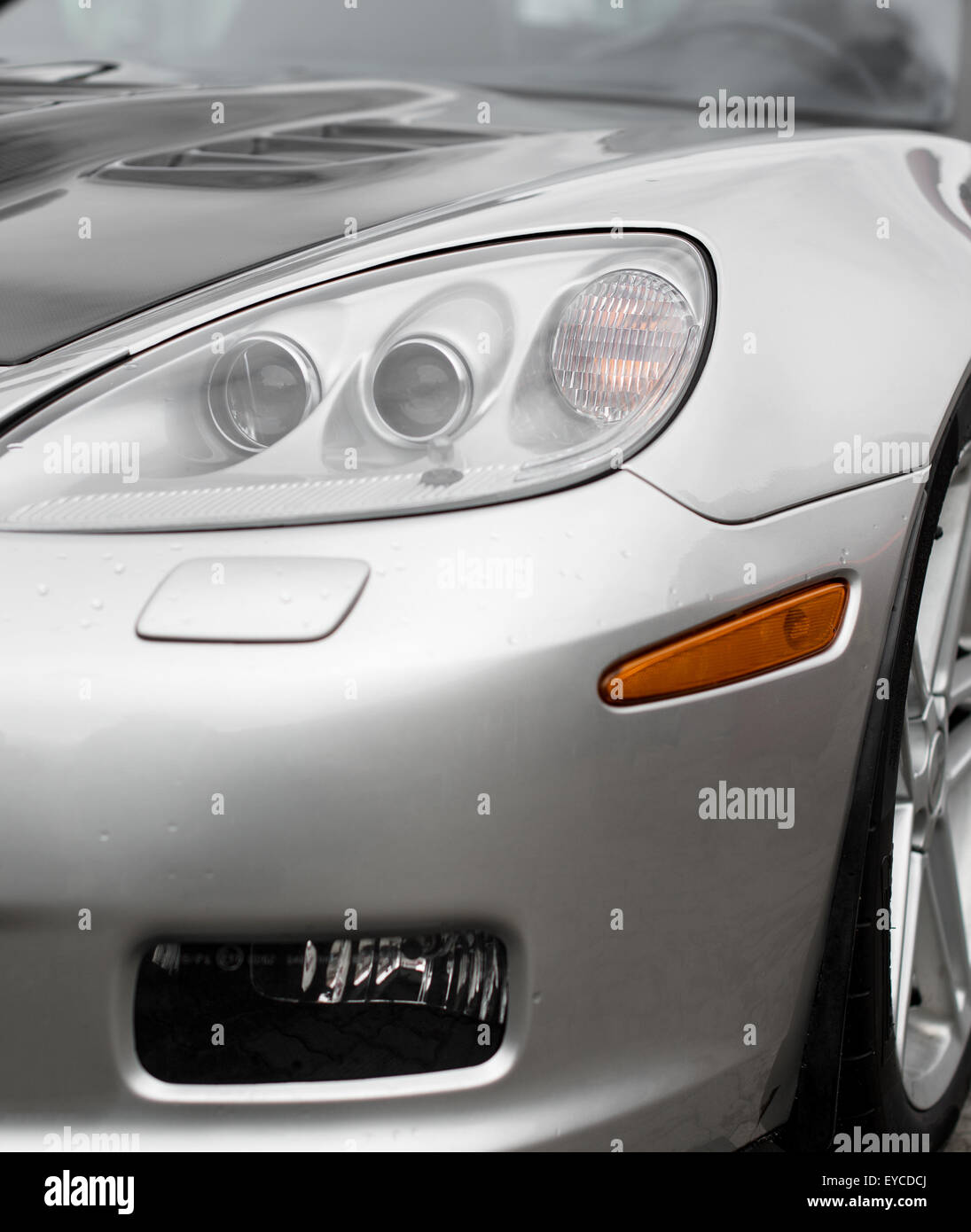 Close-up view of silver sports car headlight Stock Photo - Alamy