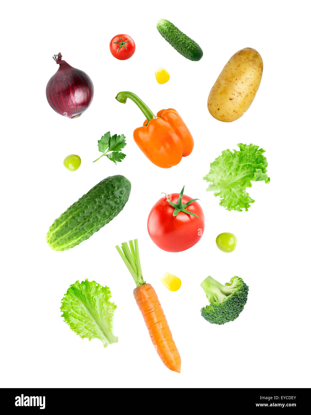 Falling fresh vegetables on white background Stock Photo - Alamy