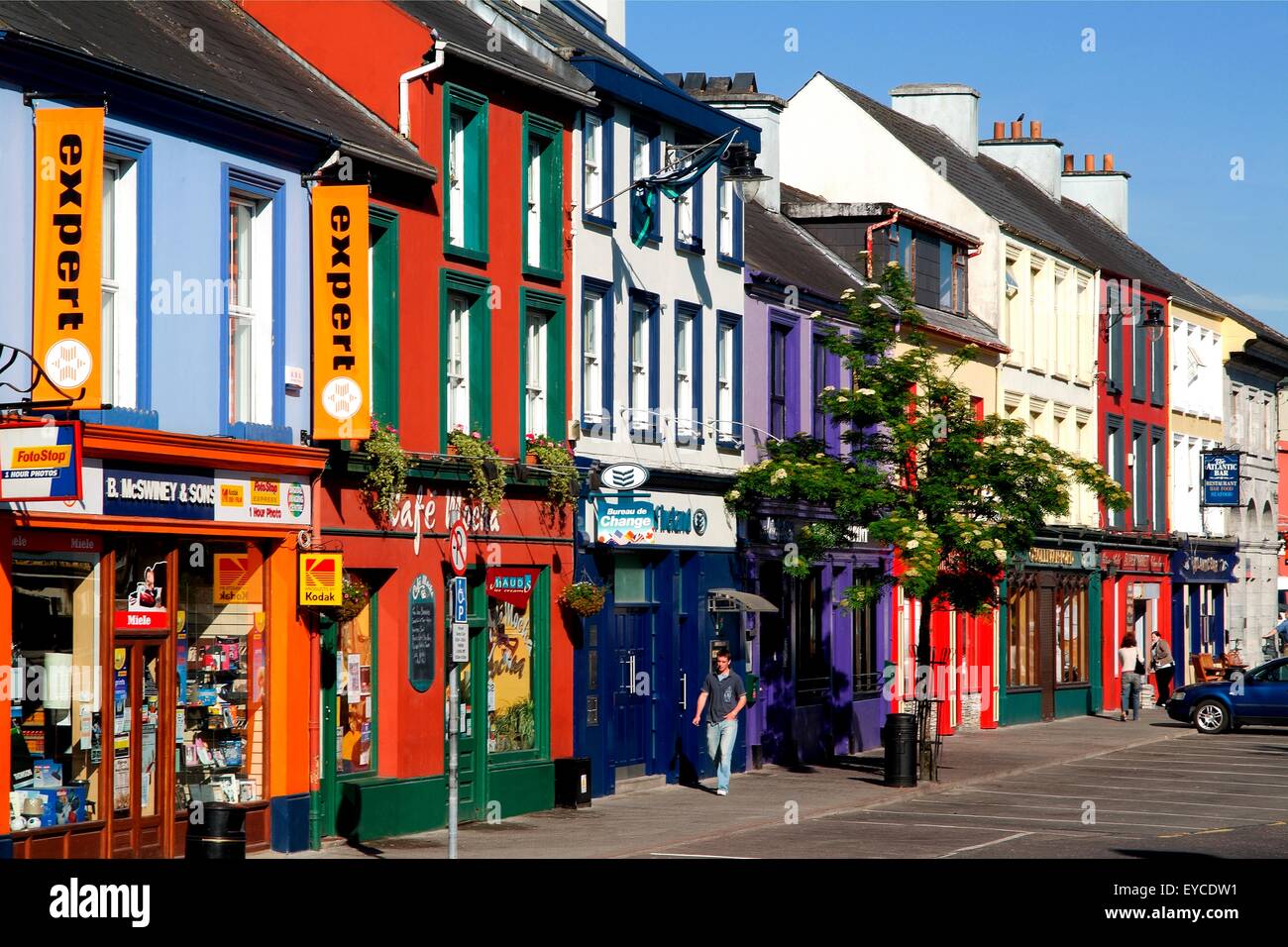 Kenmare, Co Kerry, Ireland; Traditional Signs Hanging From Shopfronts ...