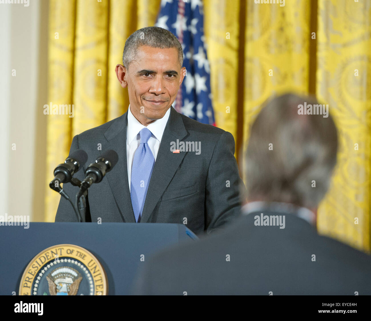 United States President Barack Obama listens to a question from CBS ...