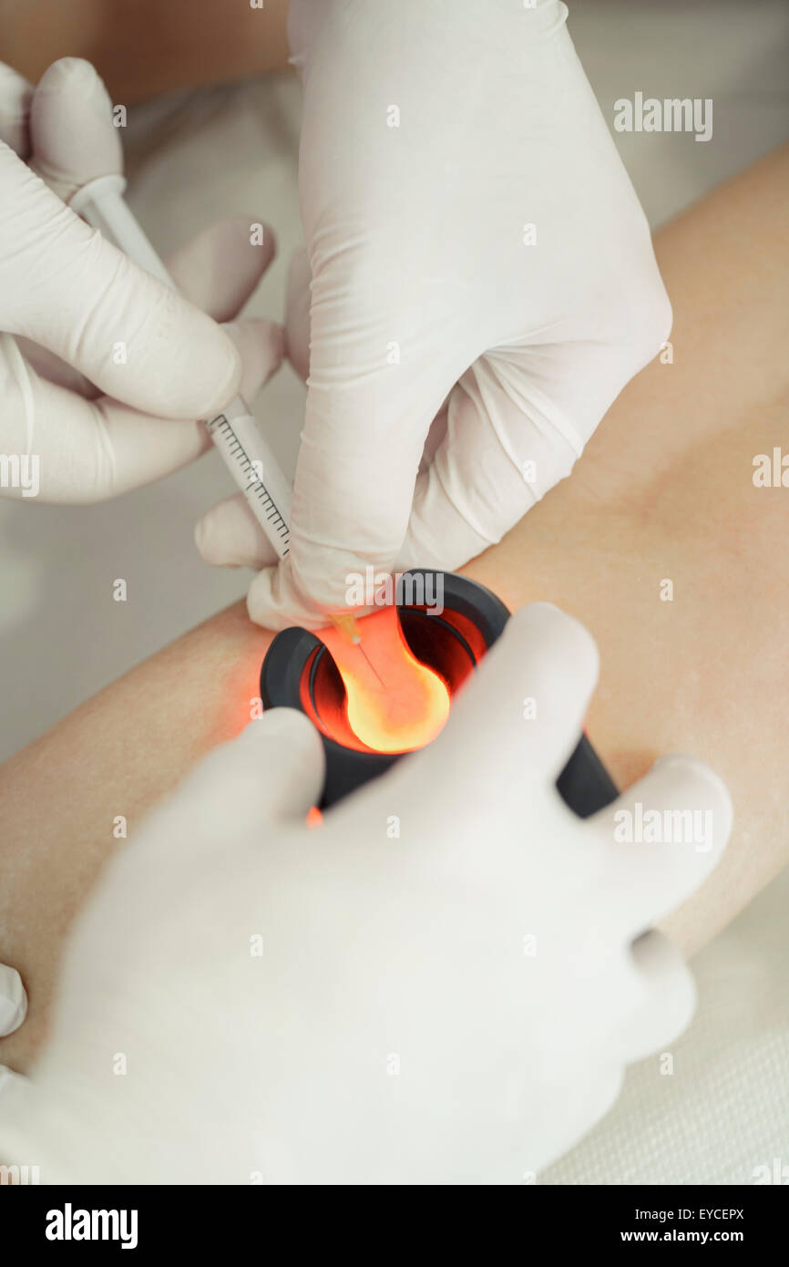 Patient getting injection, close-up Stock Photo - Alamy