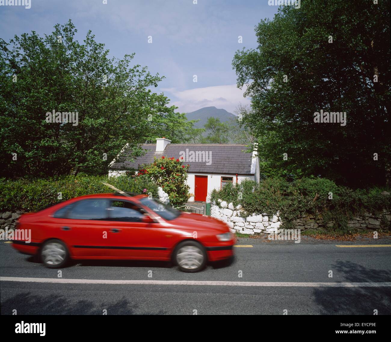 Car driving past hi-res stock photography and images - Alamy