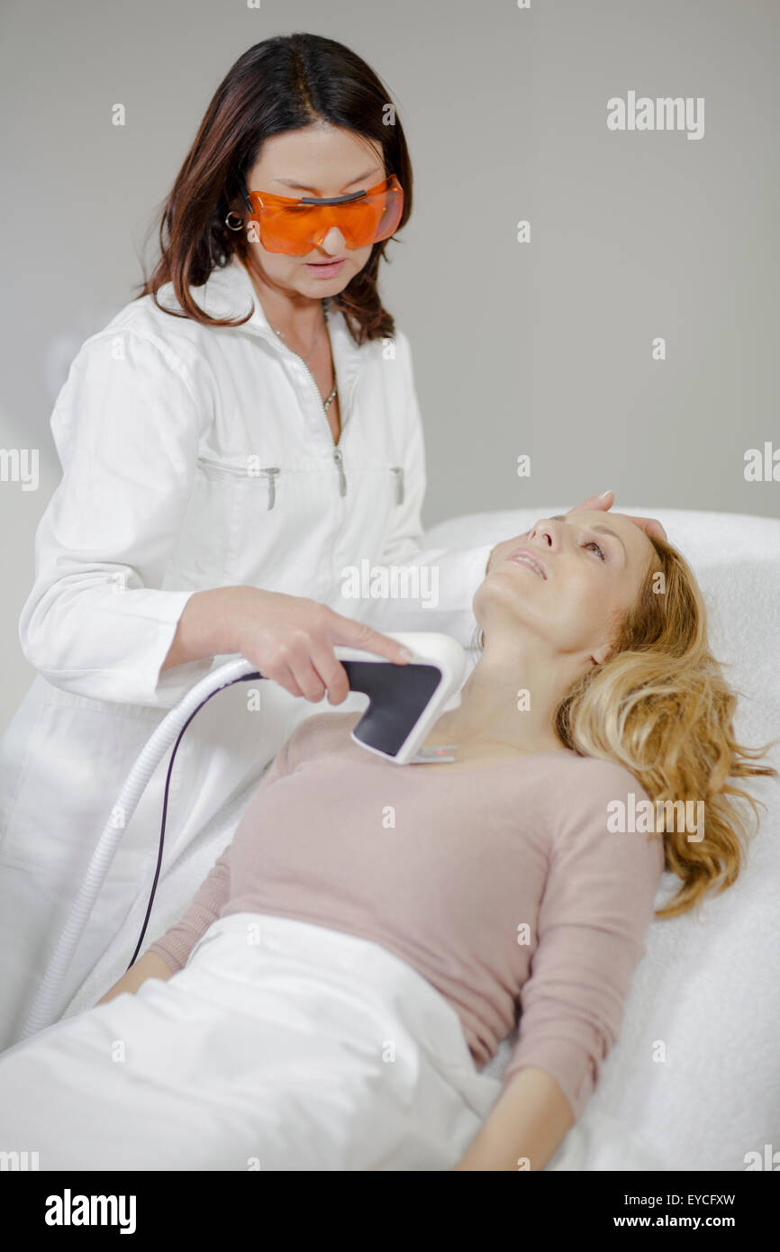 Woman receiving beauty treatment Stock Photo - Alamy