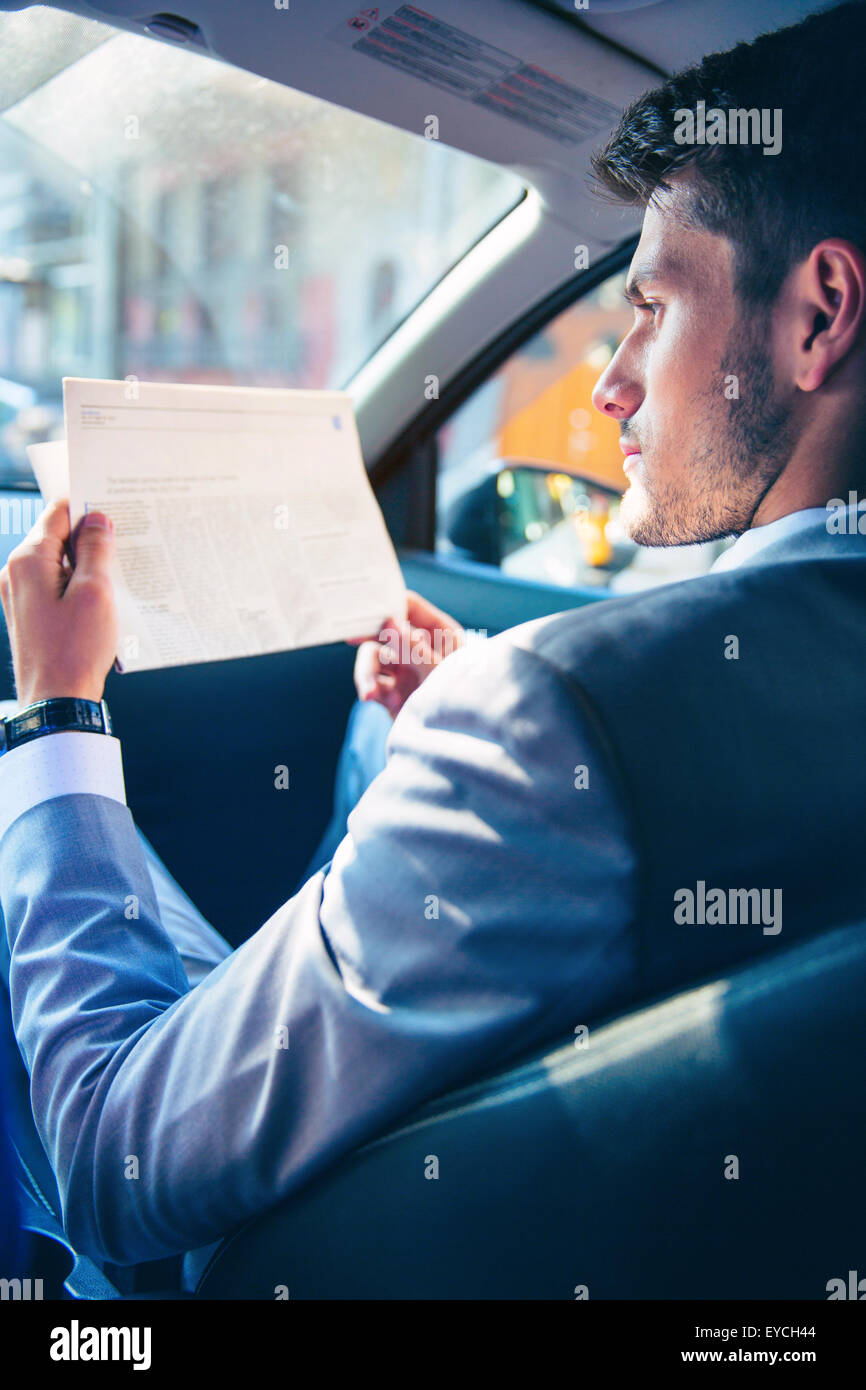 Businessman sitting in cab hi-res stock photography and images - Alamy