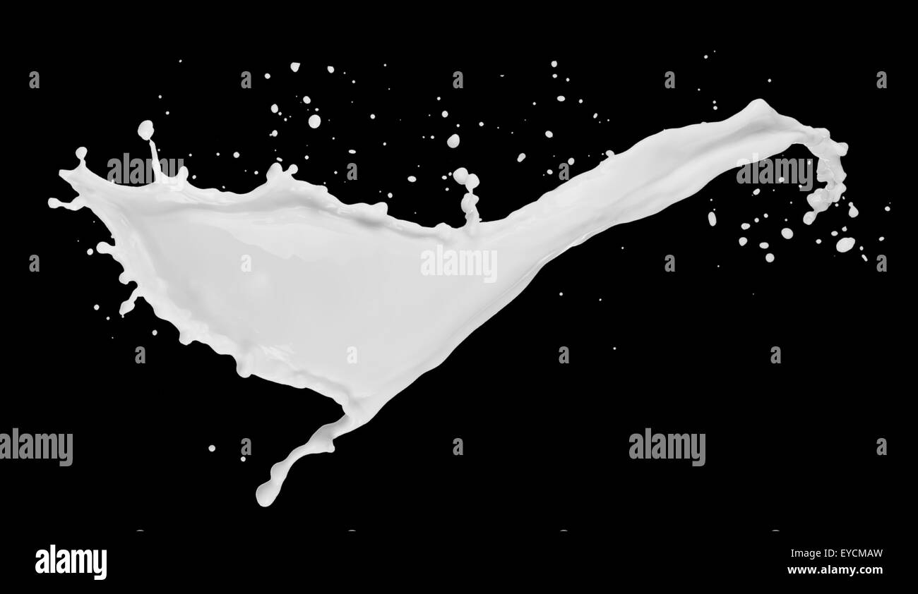 milk splash isolated on the black background Stock Photo - Alamy