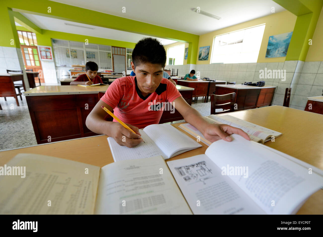 Peru, Brena, pupils doing homework in a classroom Stock Photo - Alamy