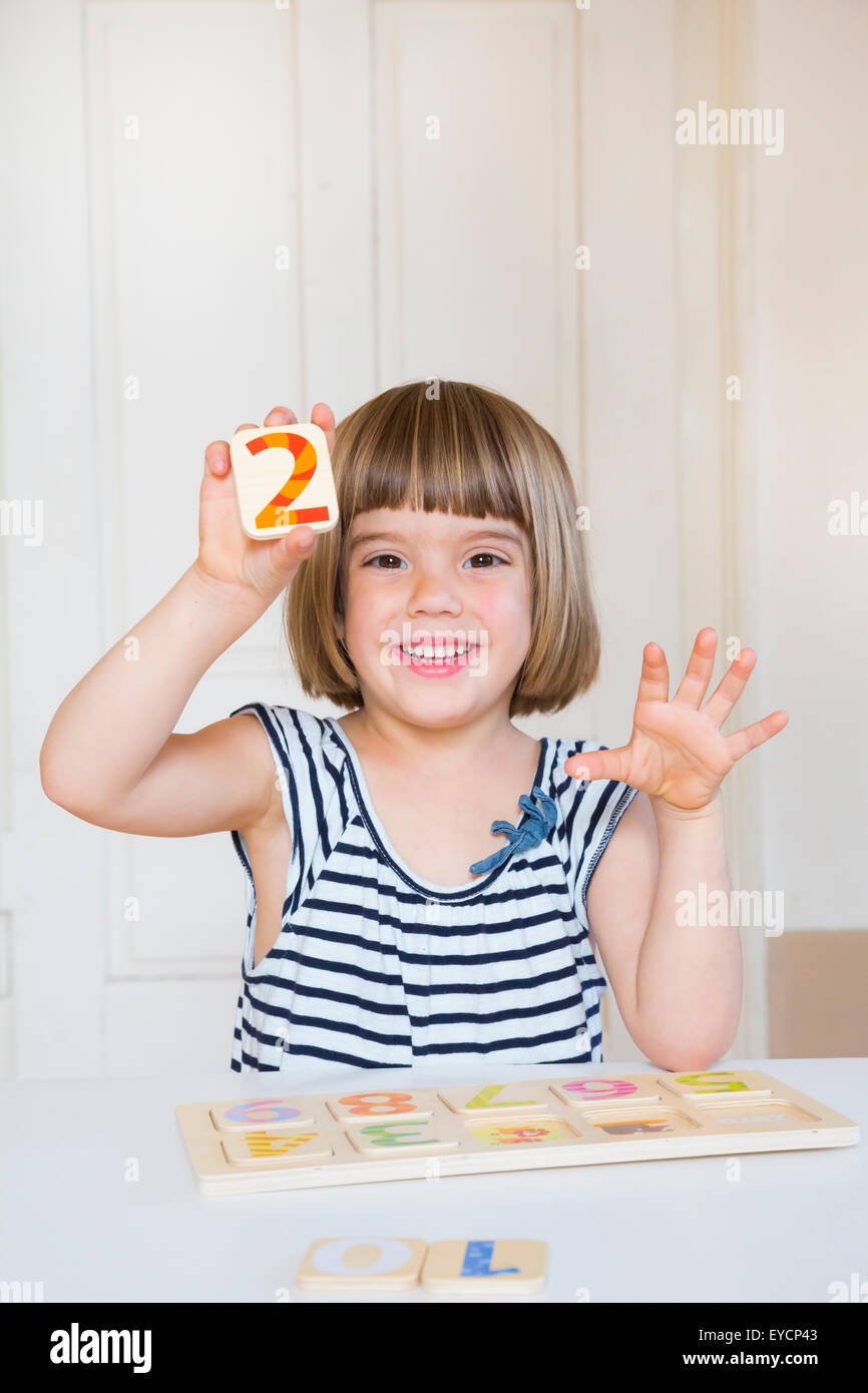 Little wooden figures hi-res stock photography and images - Alamy