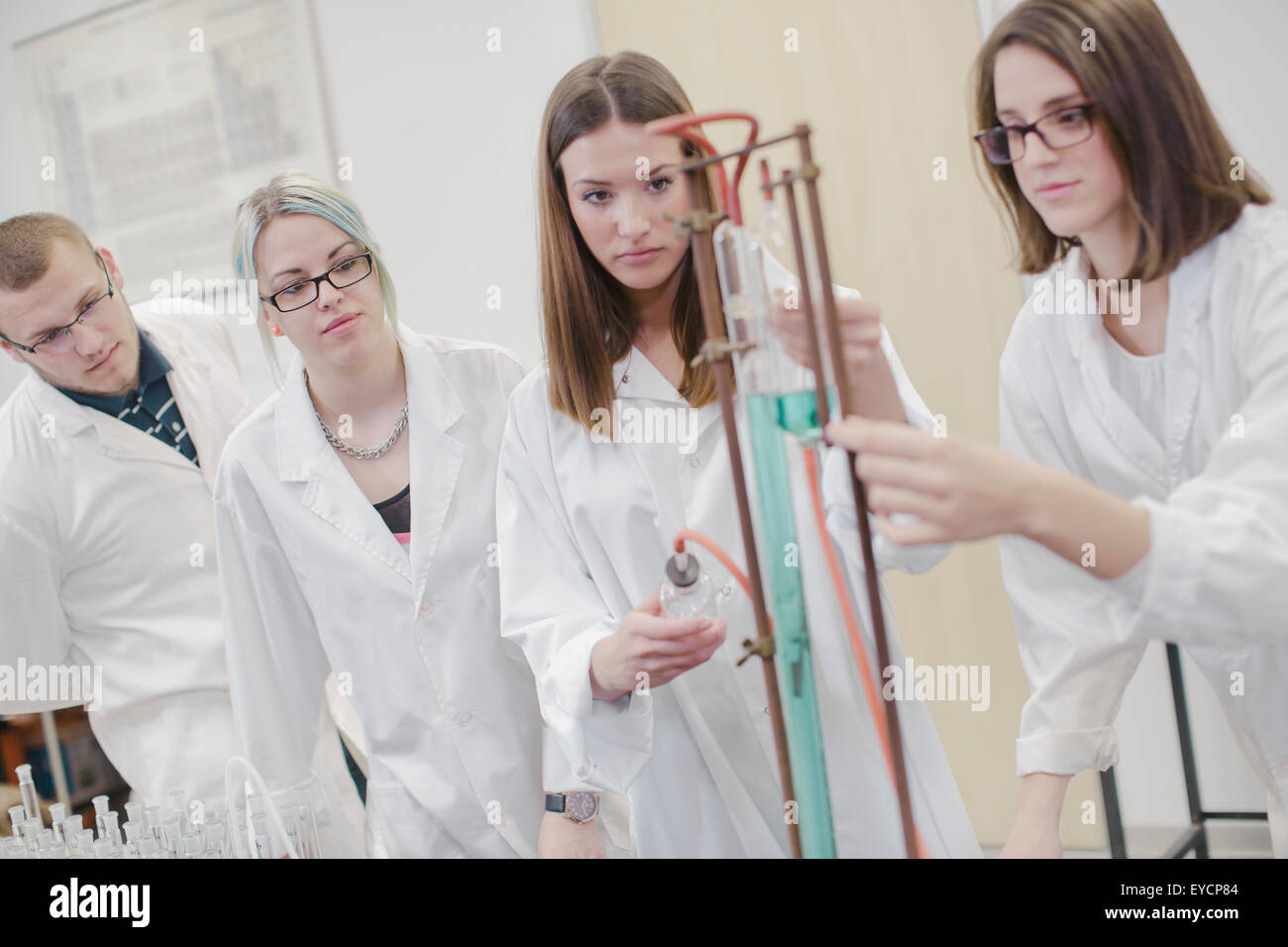 Students experimenting in lab Stock Photo - Alamy