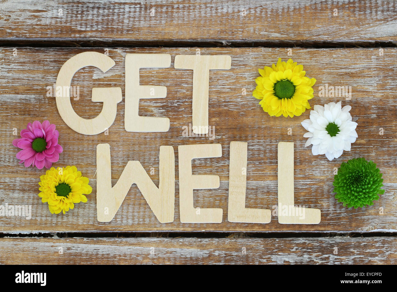 Get well written with wooden letters on rustic wood Stock Photo - Alamy