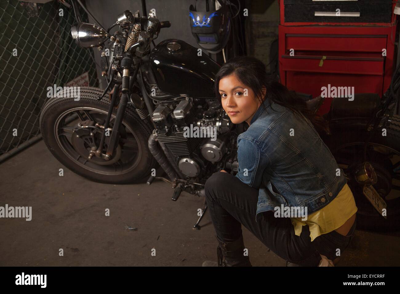 Mechanic working on motorcycle in hi-res stock photography and images ...