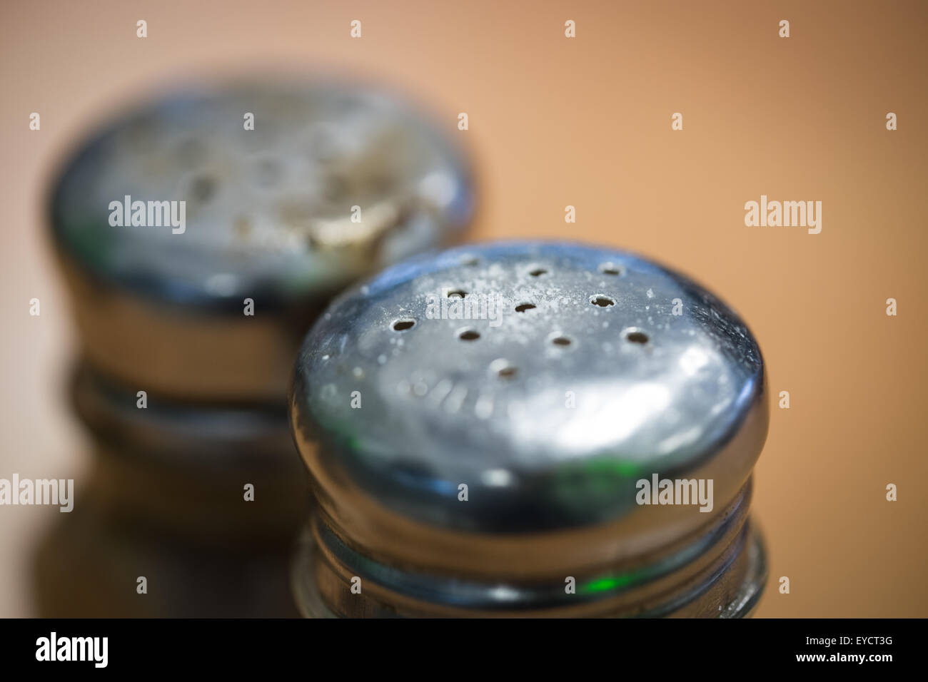 A salt and pepper shaker in a traditional greasy spoon Stock Photo - Alamy