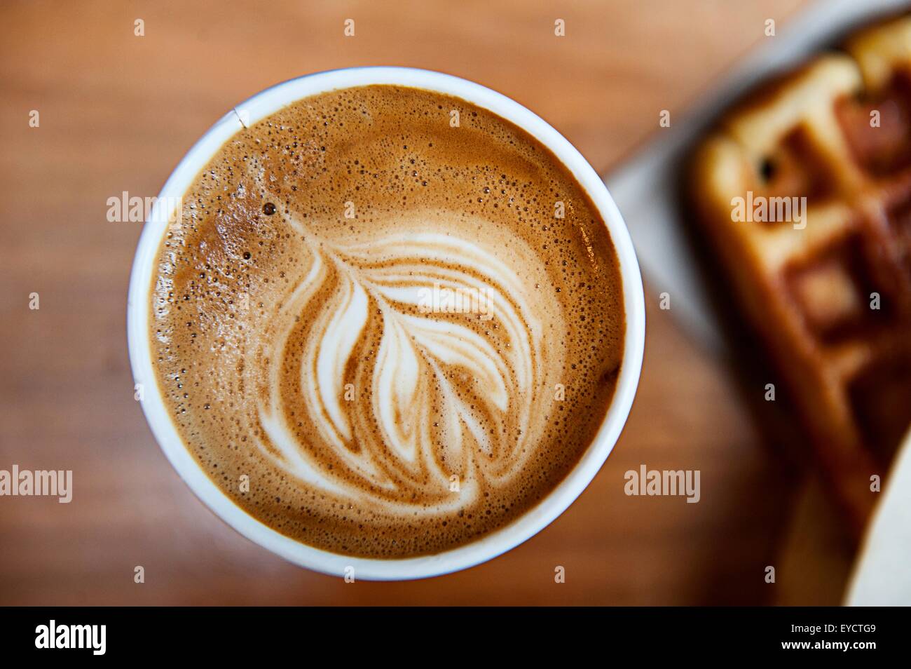 Still life with cappuccino and waffle Stock Photo - Alamy