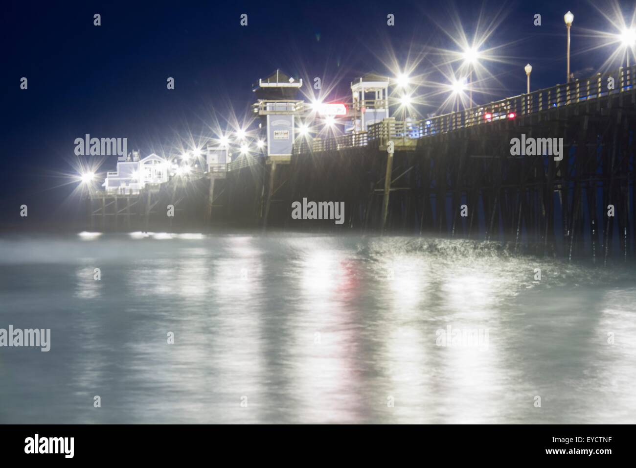 Illuminated pier, at night, California, USA Stock Photo - Alamy