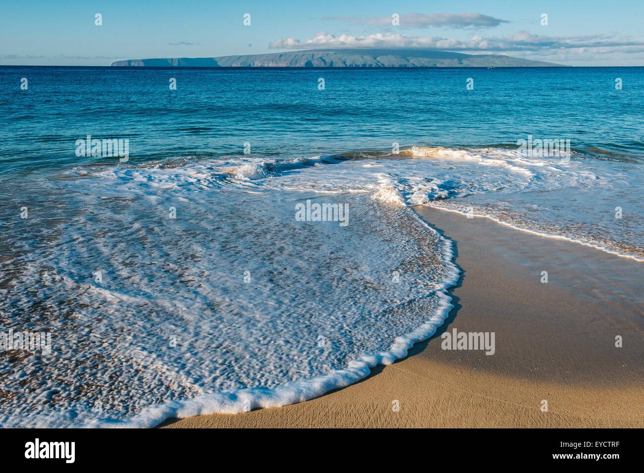 Ocean tides on beach, Maui, Hawaii Stock Photo - Alamy