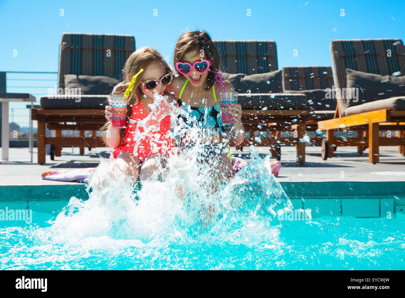 Girls poolside hi-res stock photography and images - Alamy
