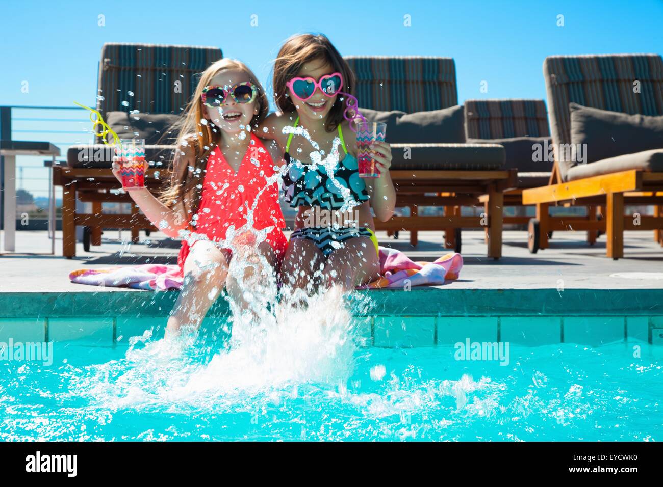 Girls poolside hi-res stock photography and images - Alamy