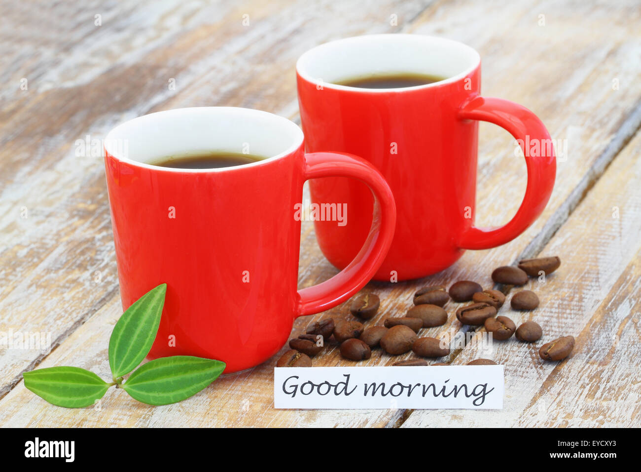 Good morning card with two mugs of coffee with coffee beans scattered ...