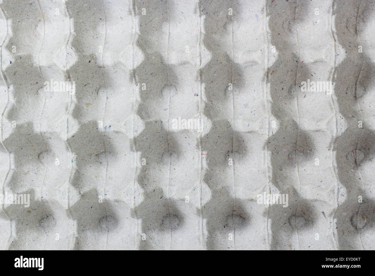 Egg carton surface, texture and pattern background Stock Photo - Alamy