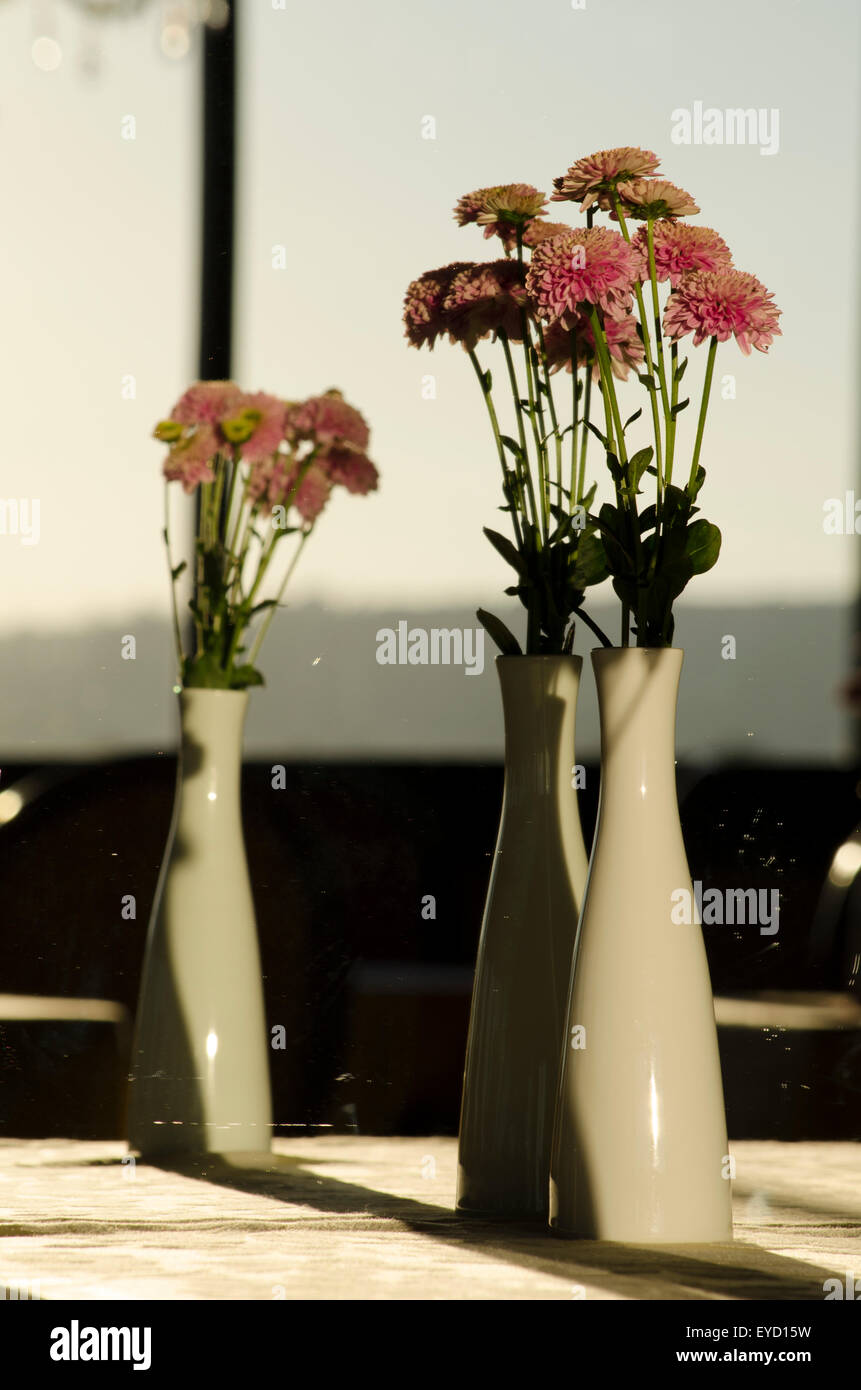Vintage flower pots and a mirror during sunset Stock Photo - Alamy