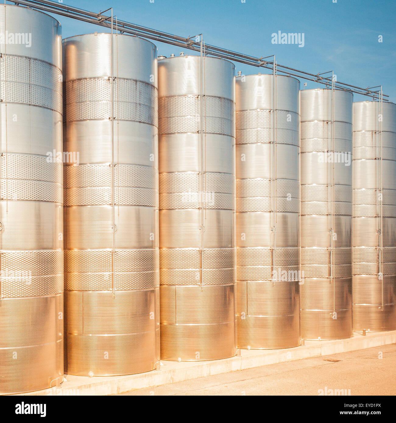 Series of stainless steel containers for wine, the sunset sun Stock ...