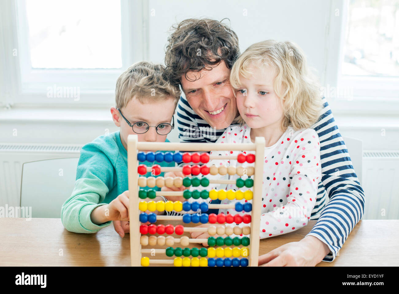 Child with abacus hi-res stock photography and images - Alamy