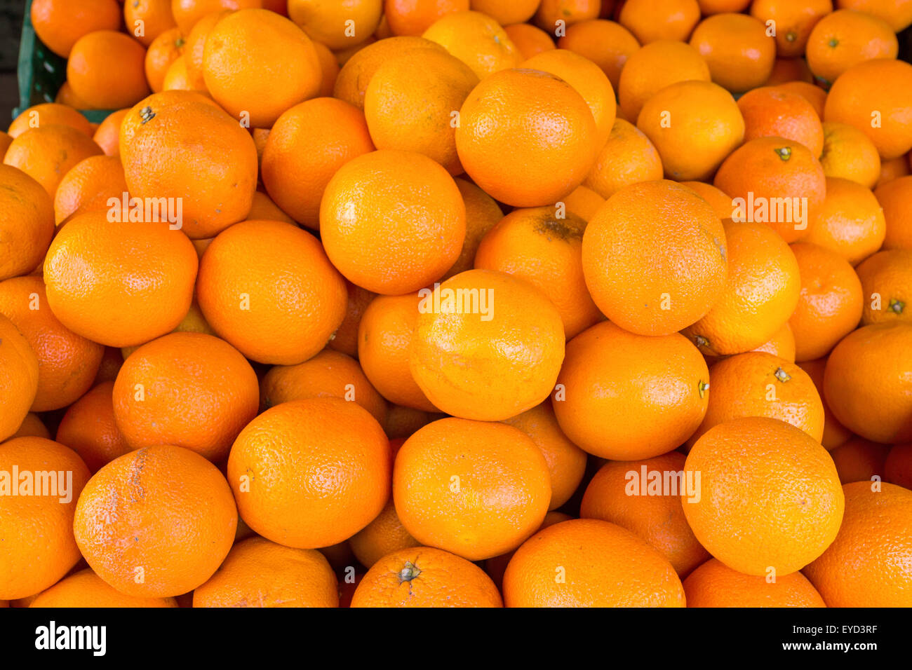 A pile of clementines seen at a small store Stock Photo - Alamy