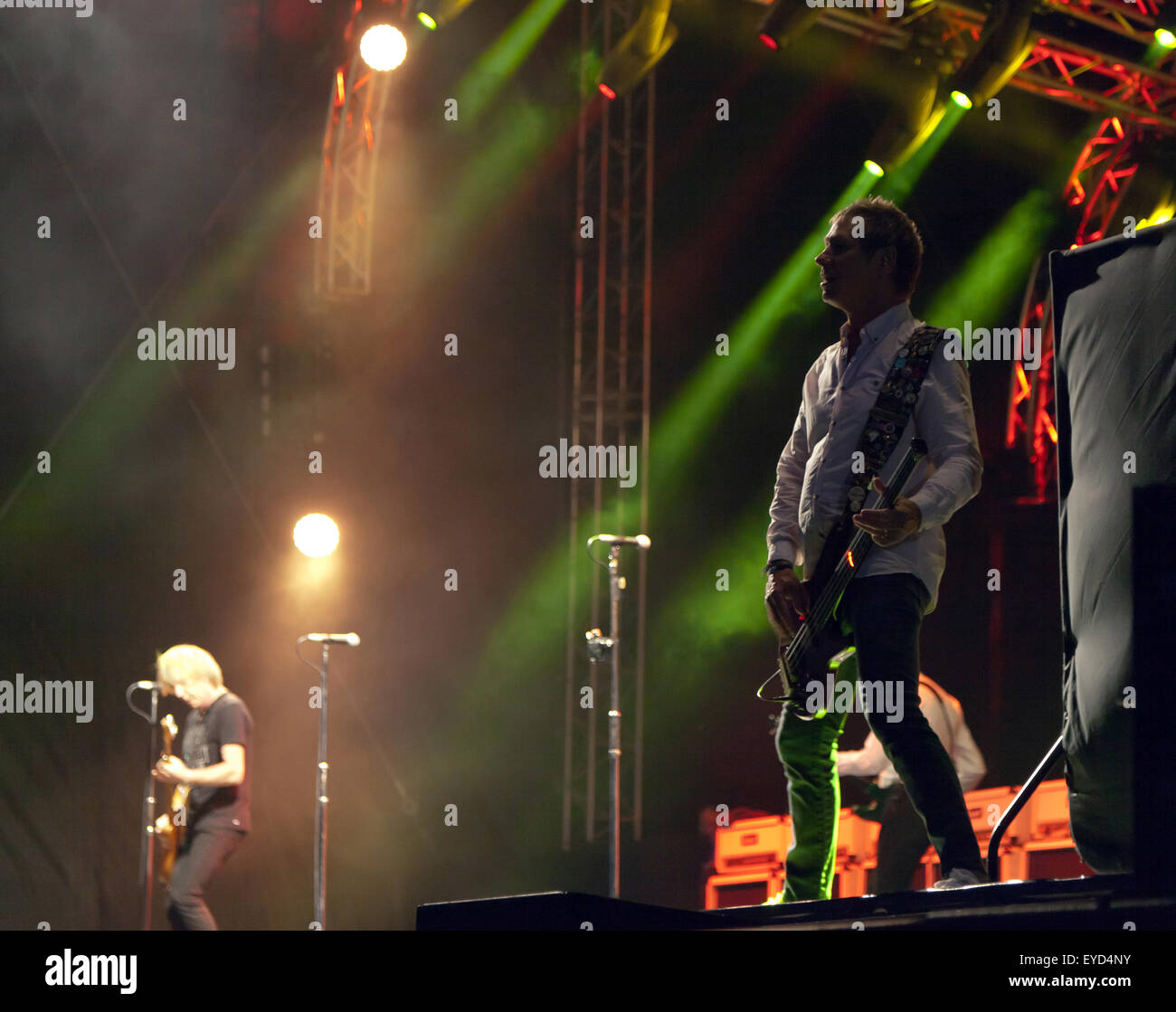 Members of Status Quo performing in a special 25th anniversary concert ...